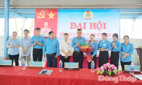 Ms. Dang Thi Tho holds the position of Chairperson of the Trade Union ...