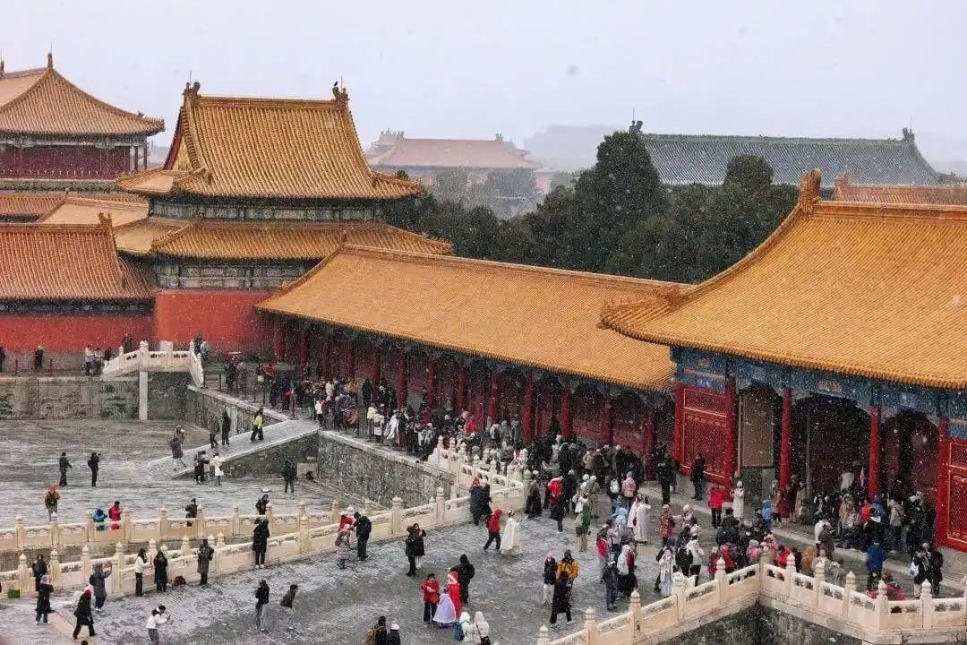 Snow has fallen on the Forbidden City.