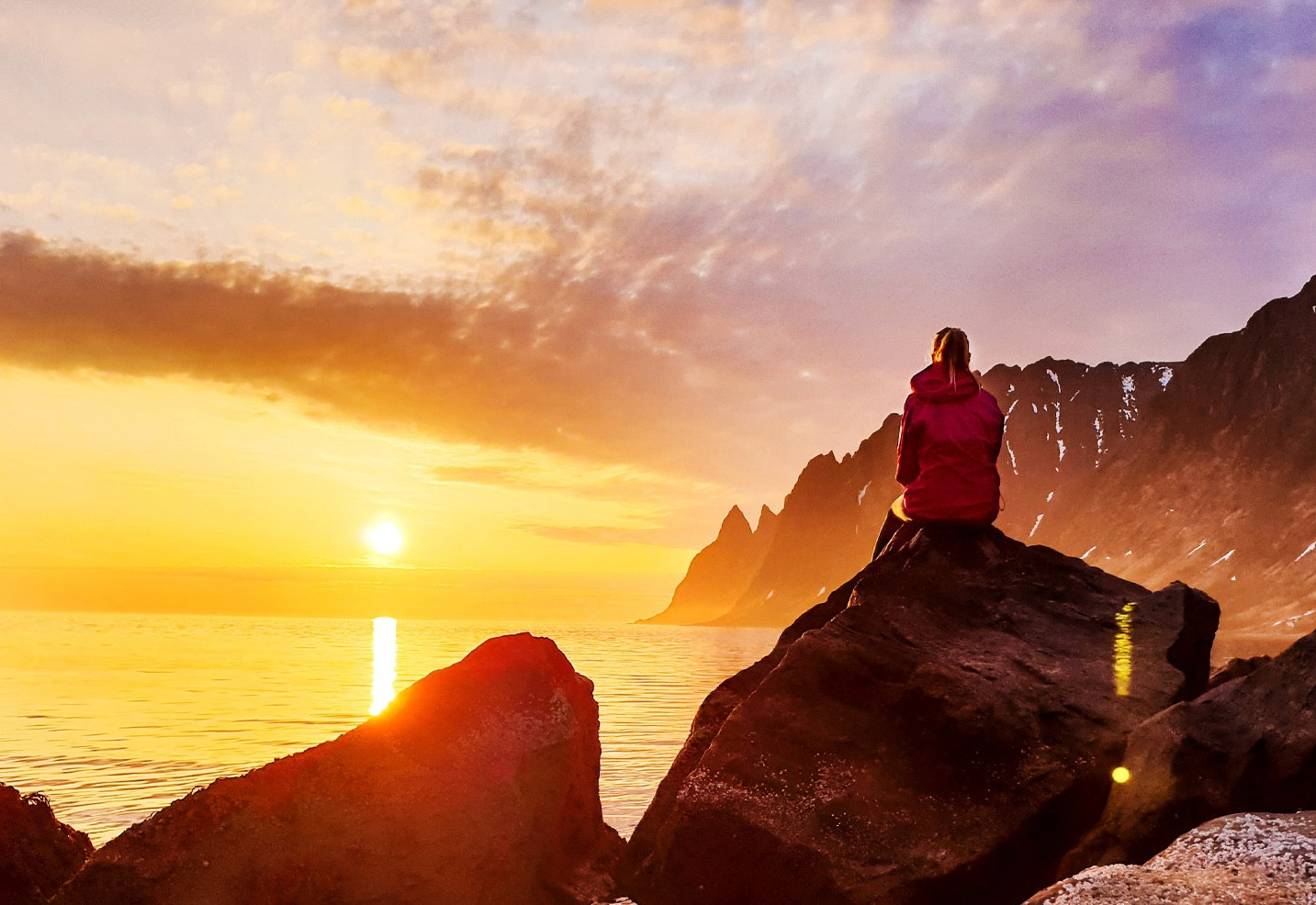 Which country sees the sun rise at midnight?