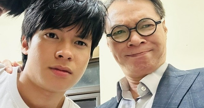 The son, who looks exactly like People's Artist Tran Luc, landed his ...