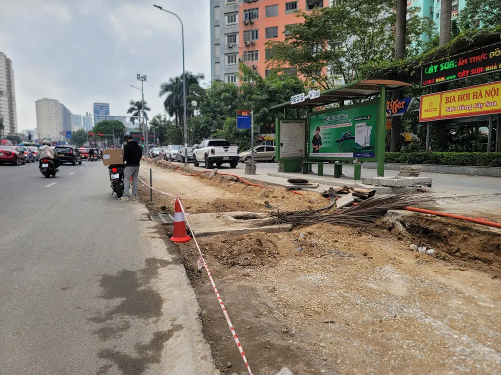 Hanoi is trimming sidewalks to widen roads for cars and motorbikes.