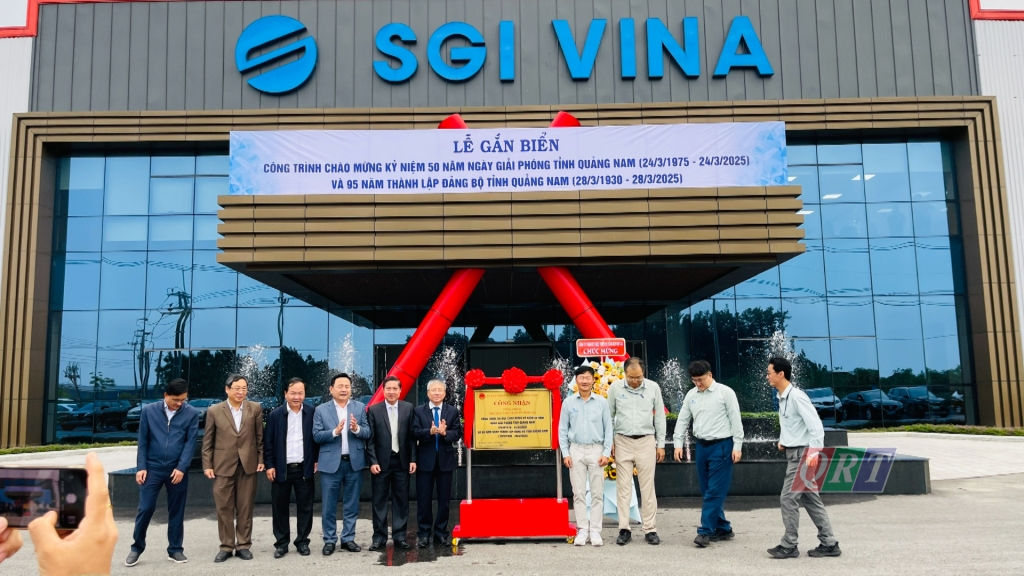 2 factories in Chu Lai Industrial Park have signs to celebrate the 50th ...