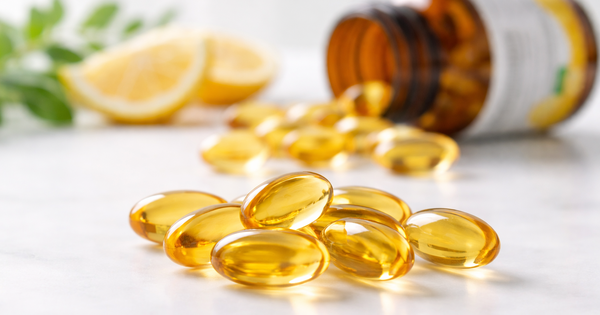 Why do omega-3 supplements cause belching, and how can this be remedied?