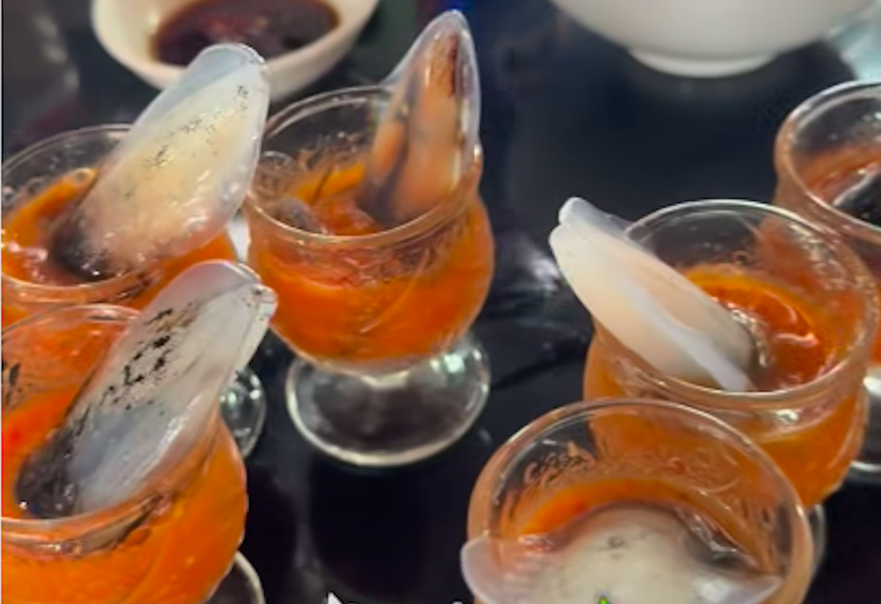 Doctors warn of the dangers of crunchy, live 'squid' drinks.
