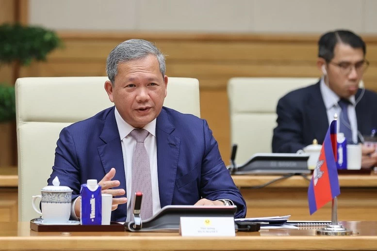 O primeiro-ministro Le Minh Hung manteve conversações com o primeiro ...